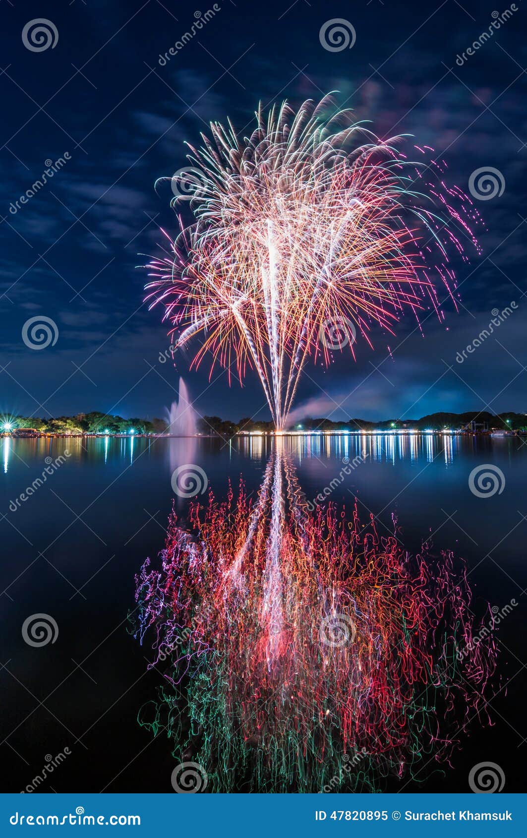Colourful Fireworks with a Reflection on the Water for Celebration ...