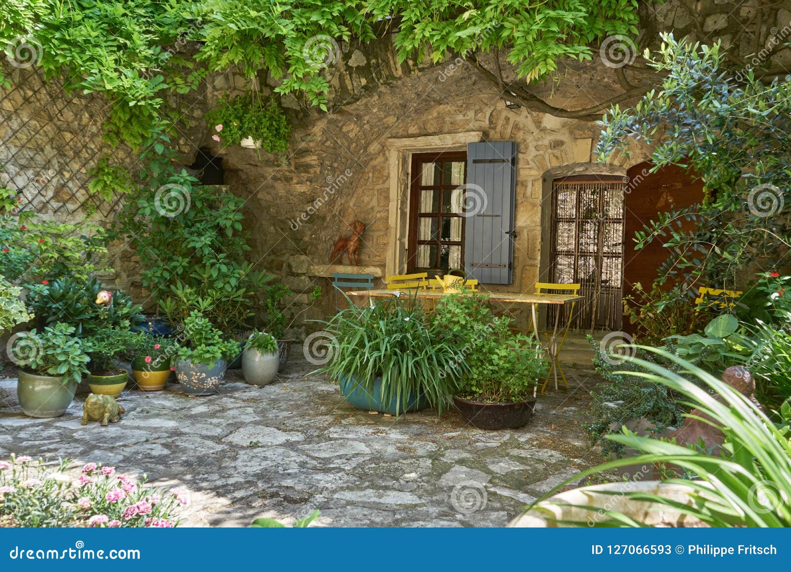 Colourful Green Patio with Ancient Stone Walls Stock Image - Image of ...