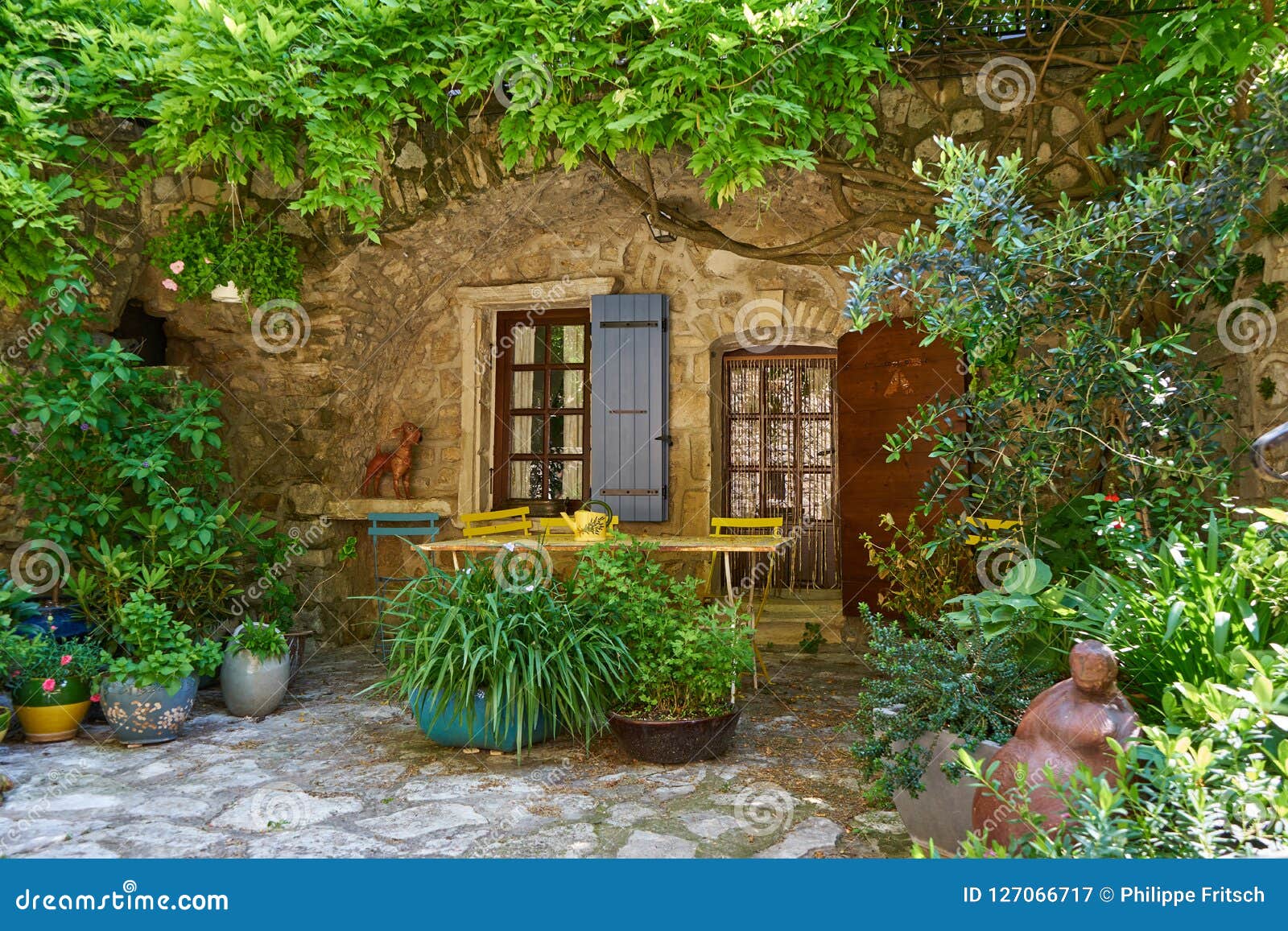 Colourful Green Patio with Ancient Stone Walls Stock Image - Image of ...