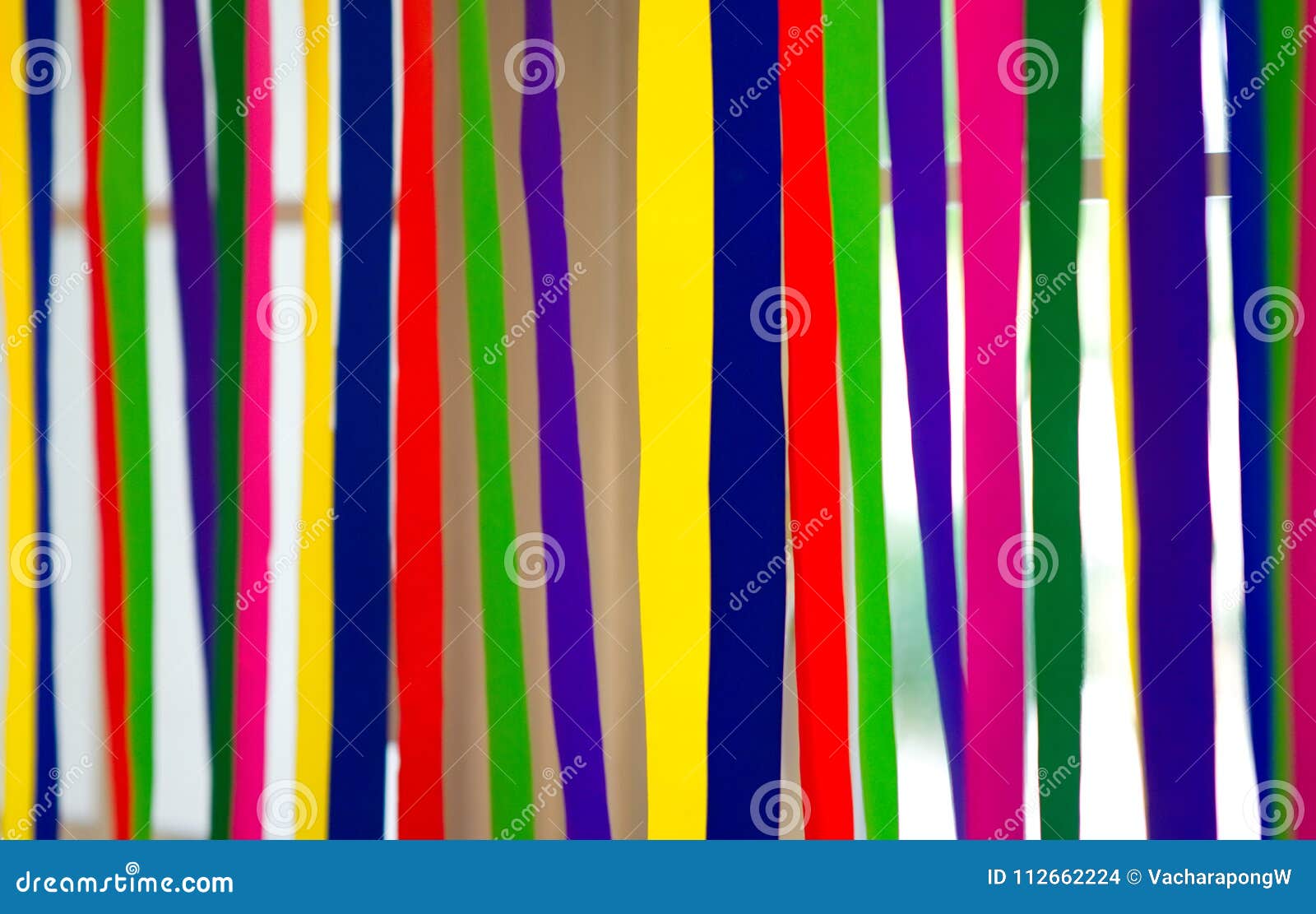 Colourful Paper Stripes Hang on Window with Natural Light Background ...