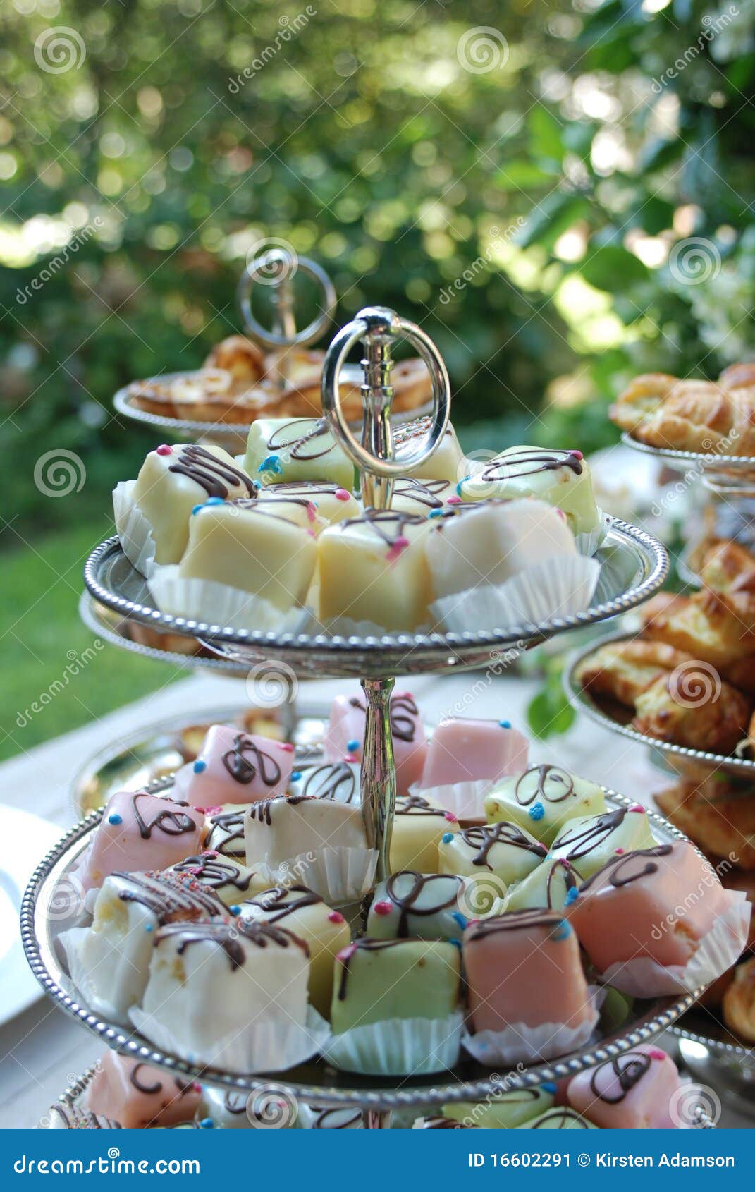 Colourful Petit Fours on a Cake Stand with Bokeh Stock Image - Image of ...