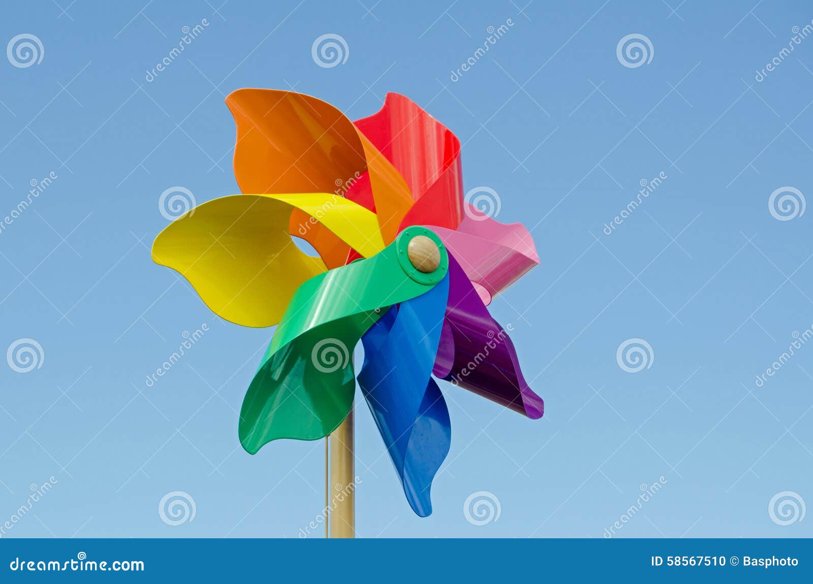 Colourful Pinwheel Against Blue Sky Stock Photo - Image of blue, orange ...