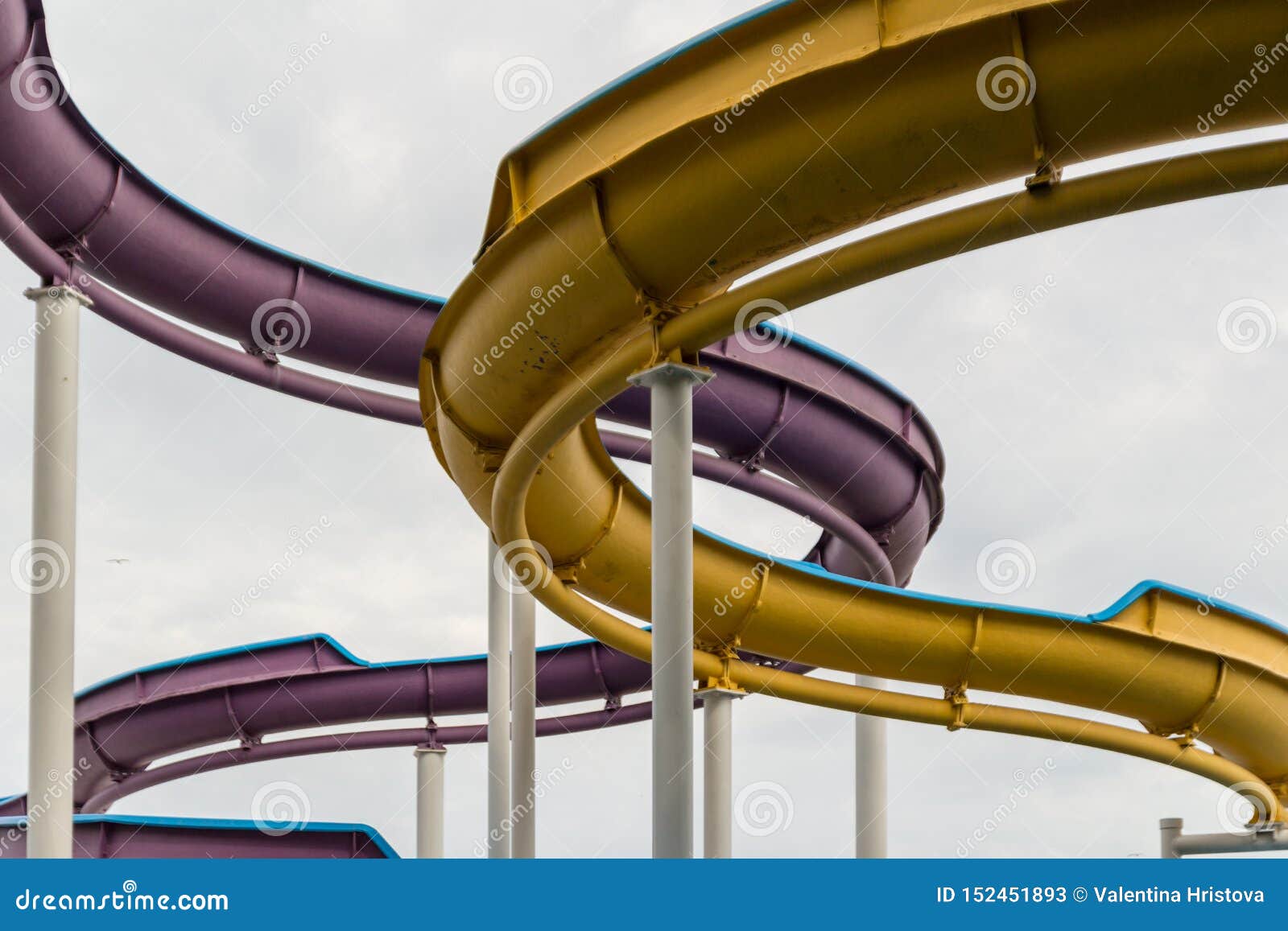 Colourful Plastic Slides in Aquapark, Bottom Side, Sky in Background ...