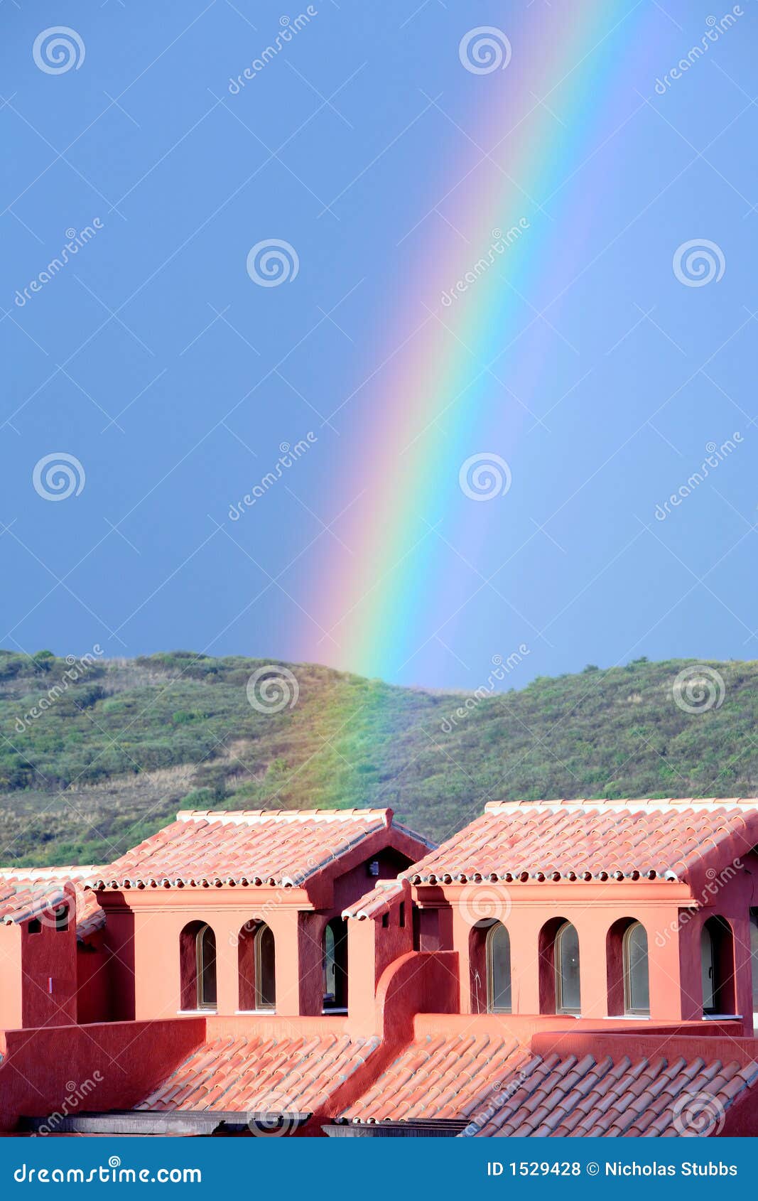 Colourful Rainbow Falling on Building after Storm Stock Photo - Image ...
