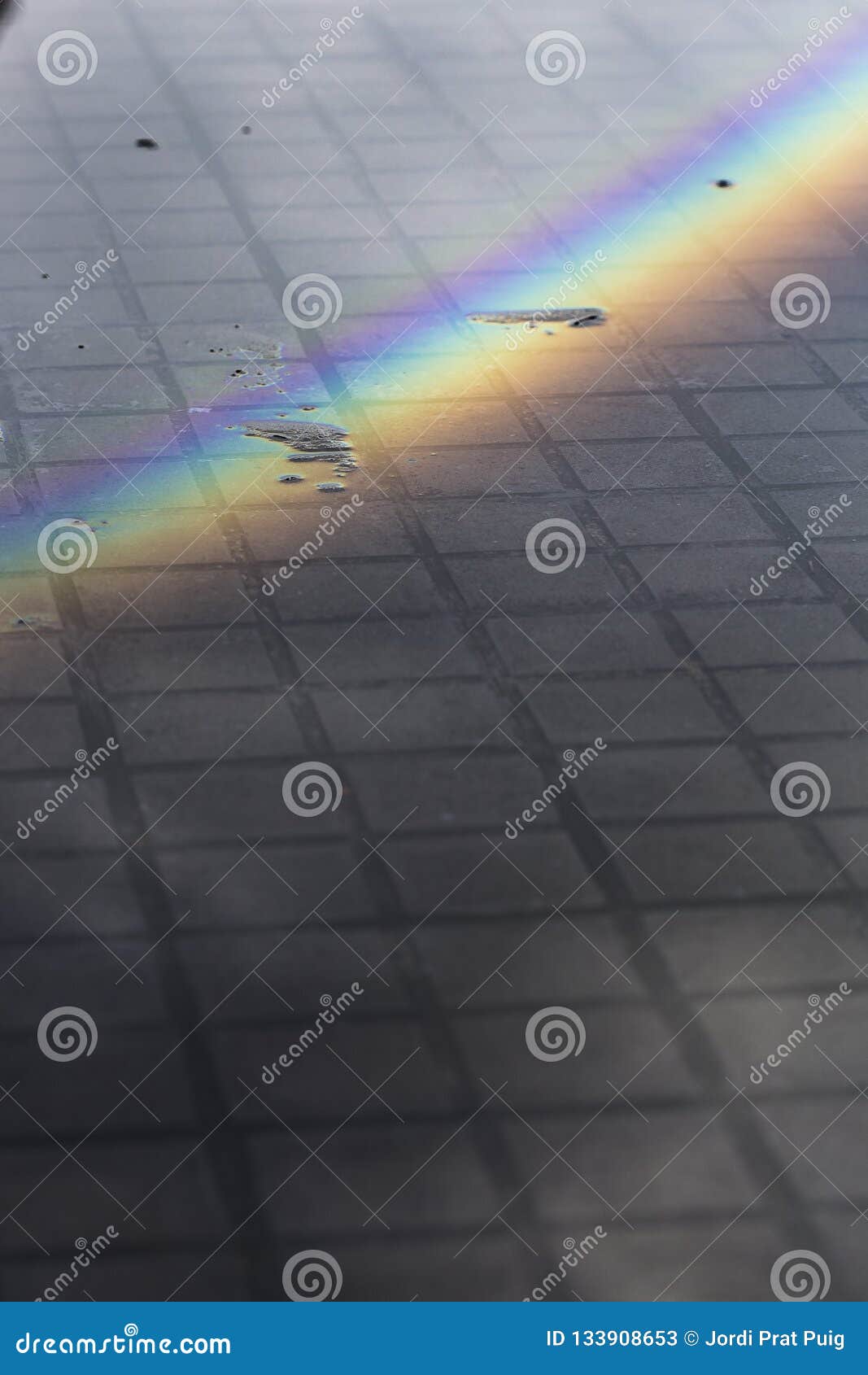 Rainbow Reflected on a Puddle Stock Image - Image of architecture ...
