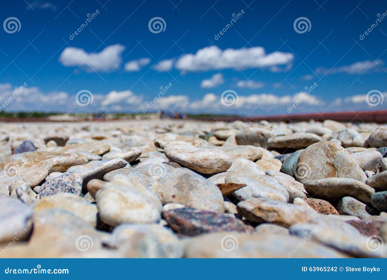 Colourful rocks on a beach stock photo. Image of outdoor - 63965242
