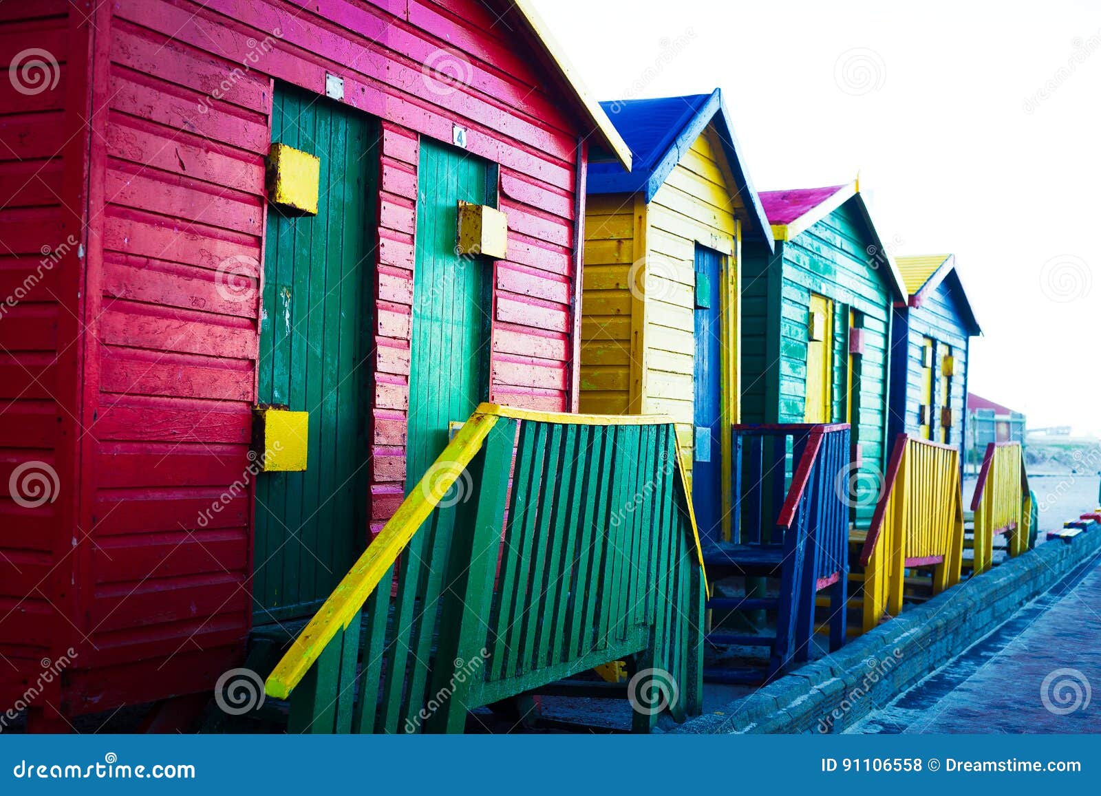 Colourful Seaside Cabins in Late Afternoon Light Stock Photo - Image of ...