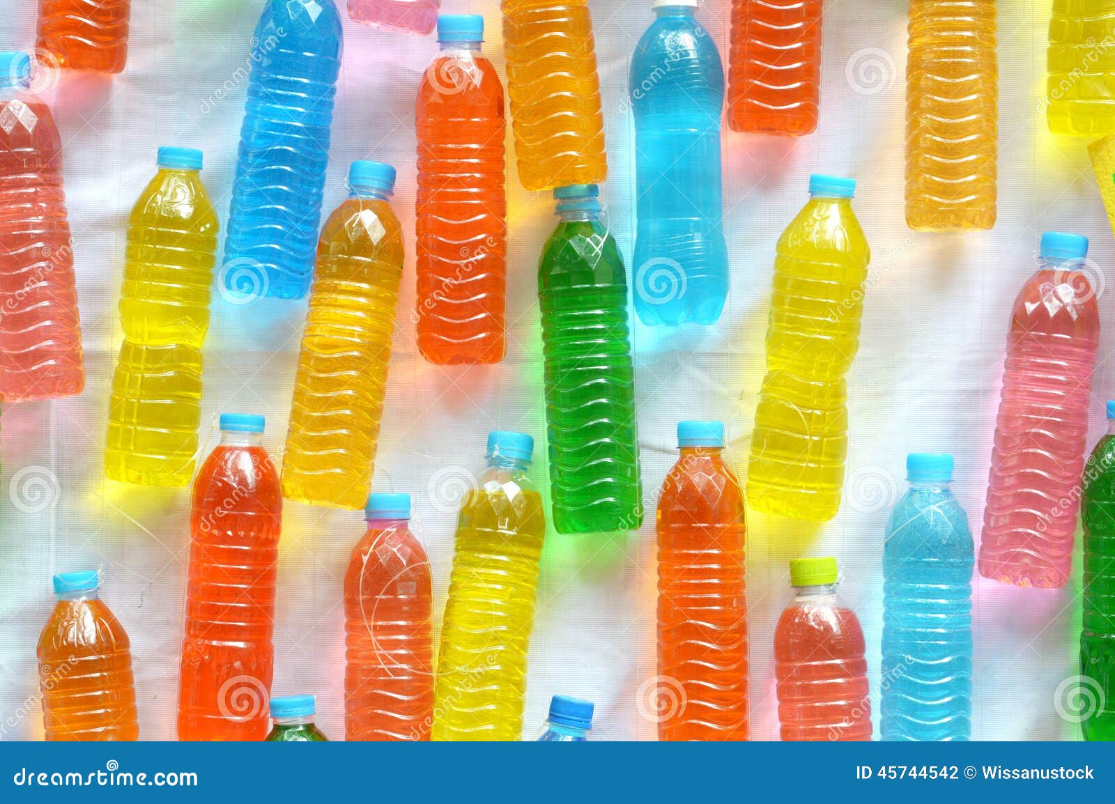 Colourful Water in Plastic Bottle Stock Photo - Image of hang, group ...