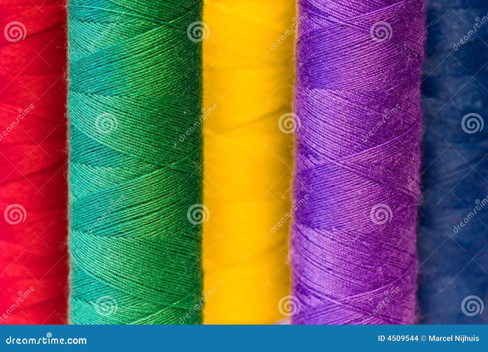 Colourful yarn spools stock photo. Image of spool, contrast - 4509544