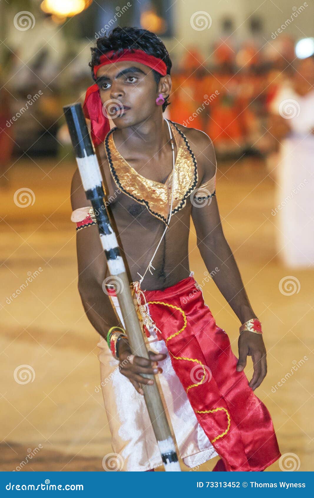 A Colourfully Dressed Stick Dancer Performs in the Kataragama Festival ...