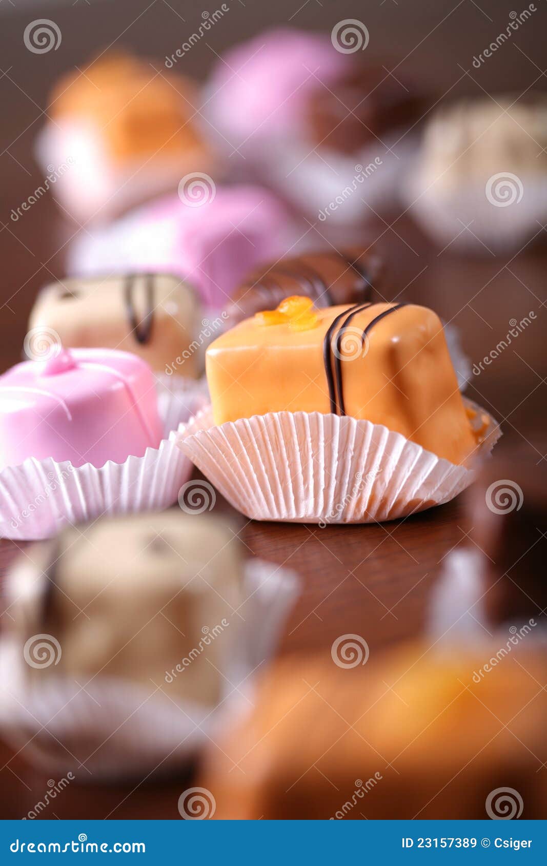 Colourfully mignon cakes stock image. Image of confectionery - 23157389