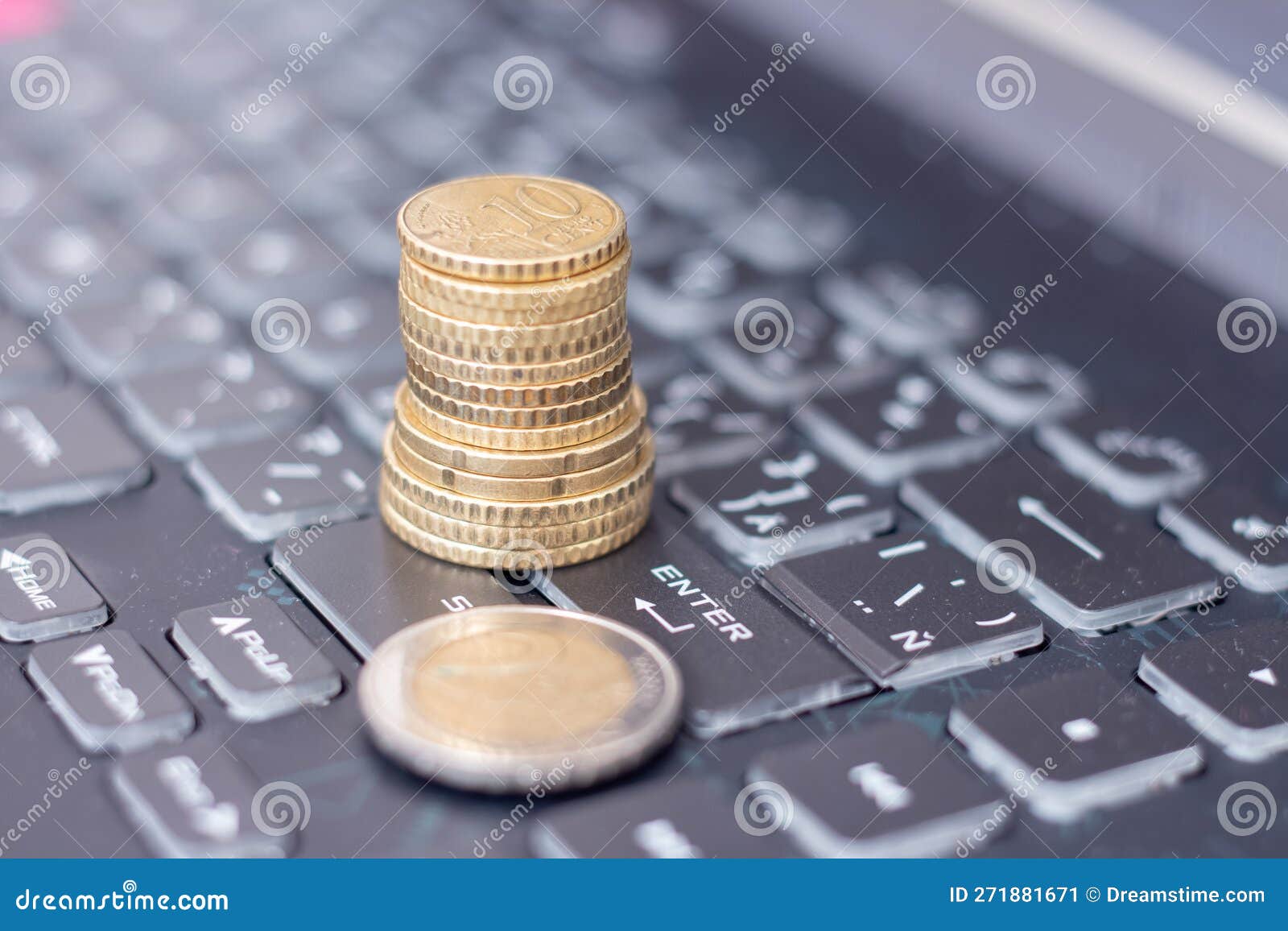 A Column of Coins on a Computer Keyboard. Stock Image - Image of ...