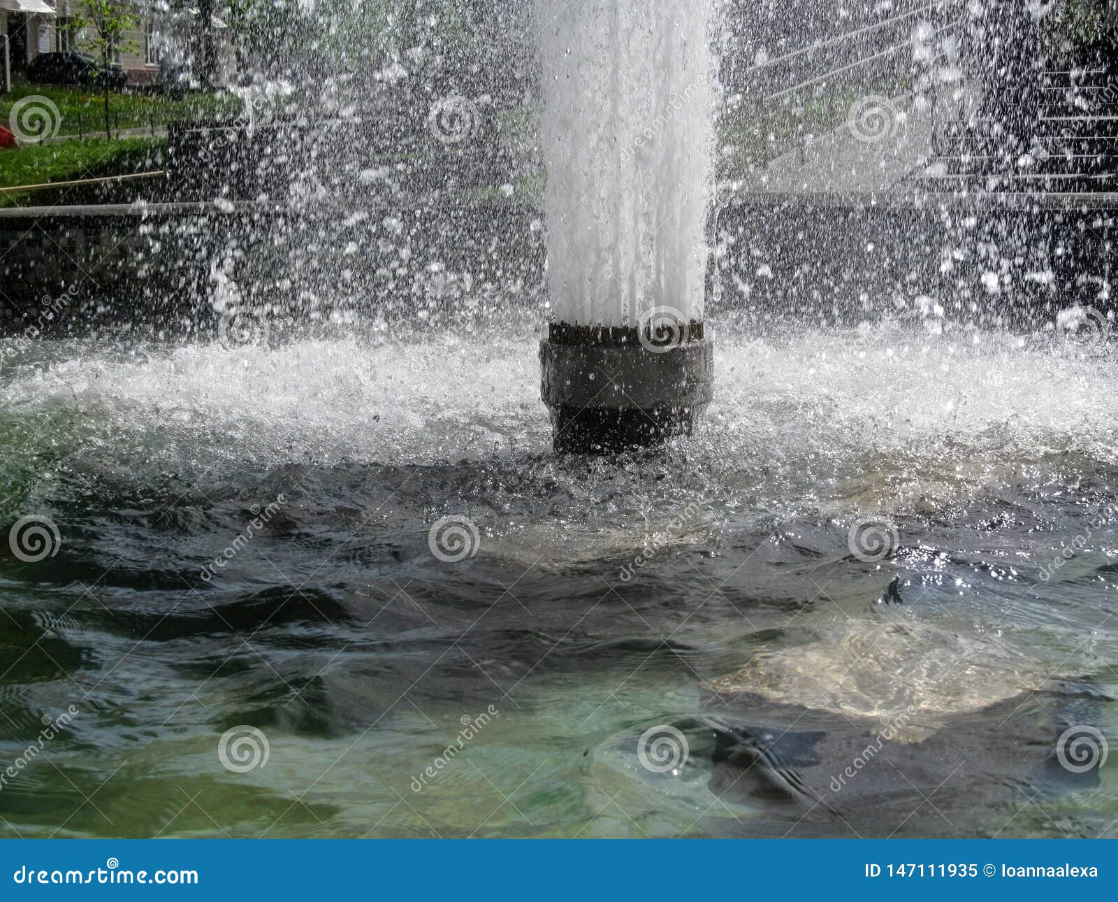 A Column of Water from a Pipe Above the Surface of the Water in the ...
