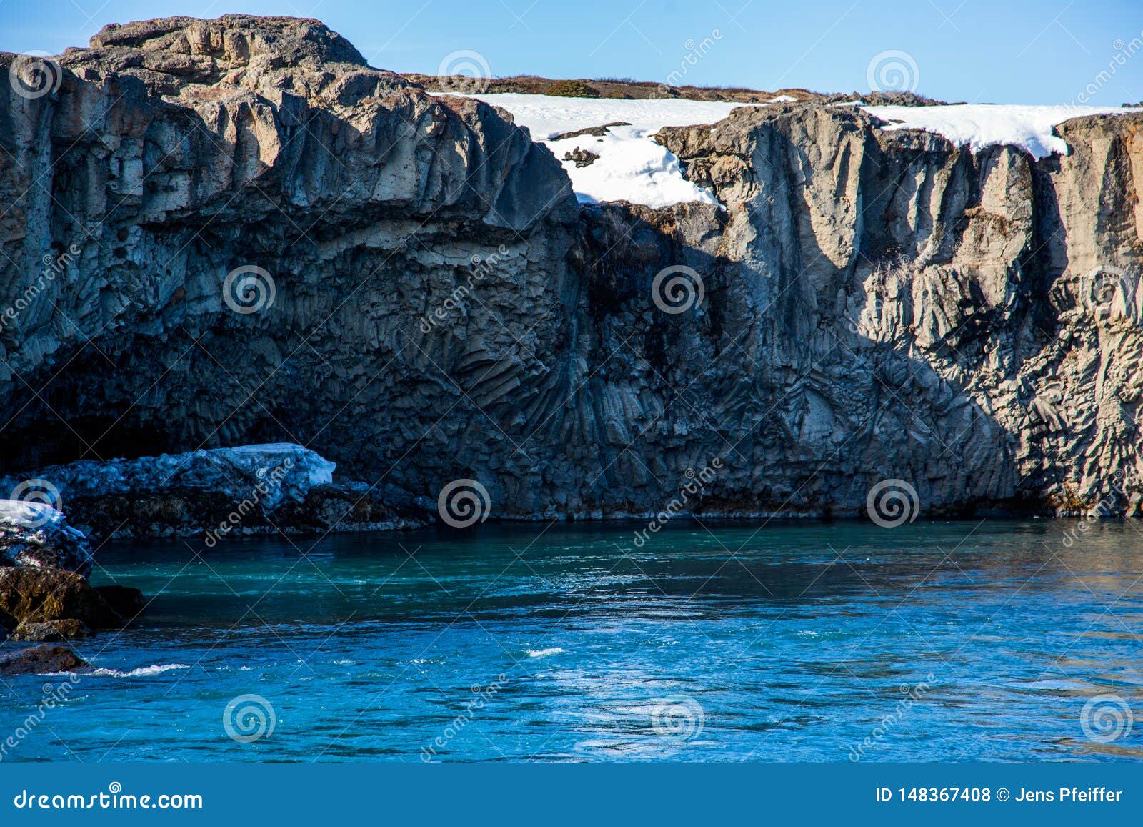 Columnar Basalt Formation Over Turquoise Water Stock Photo - Image of ...