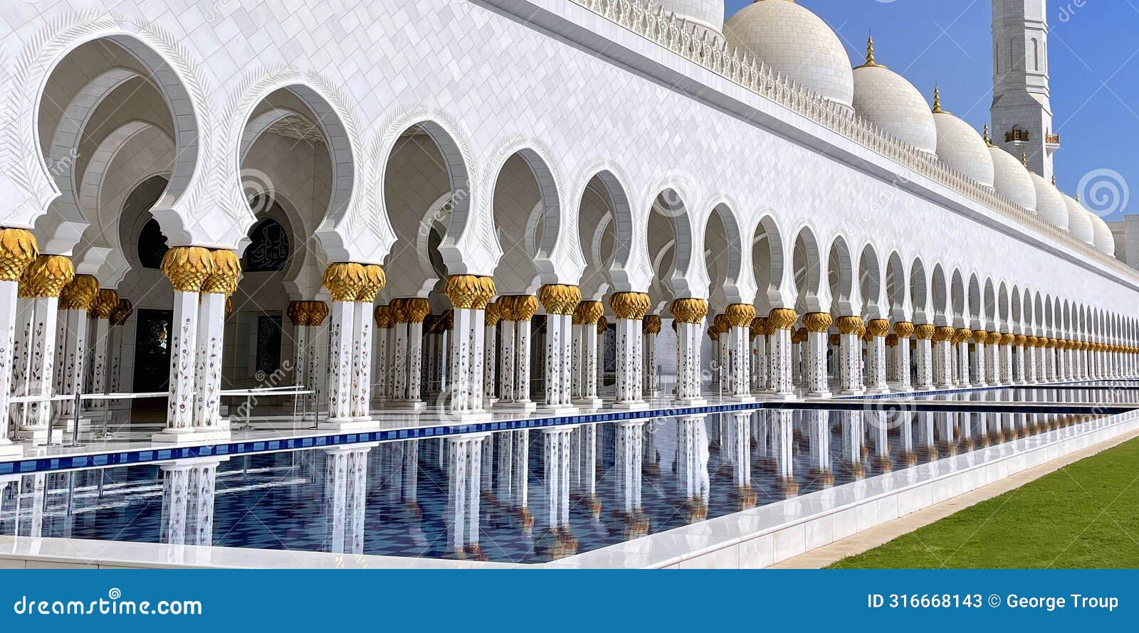 Columns And Its Reflection In Water At The Grand Mosque In Abu Dhabi Stock Image Image Of