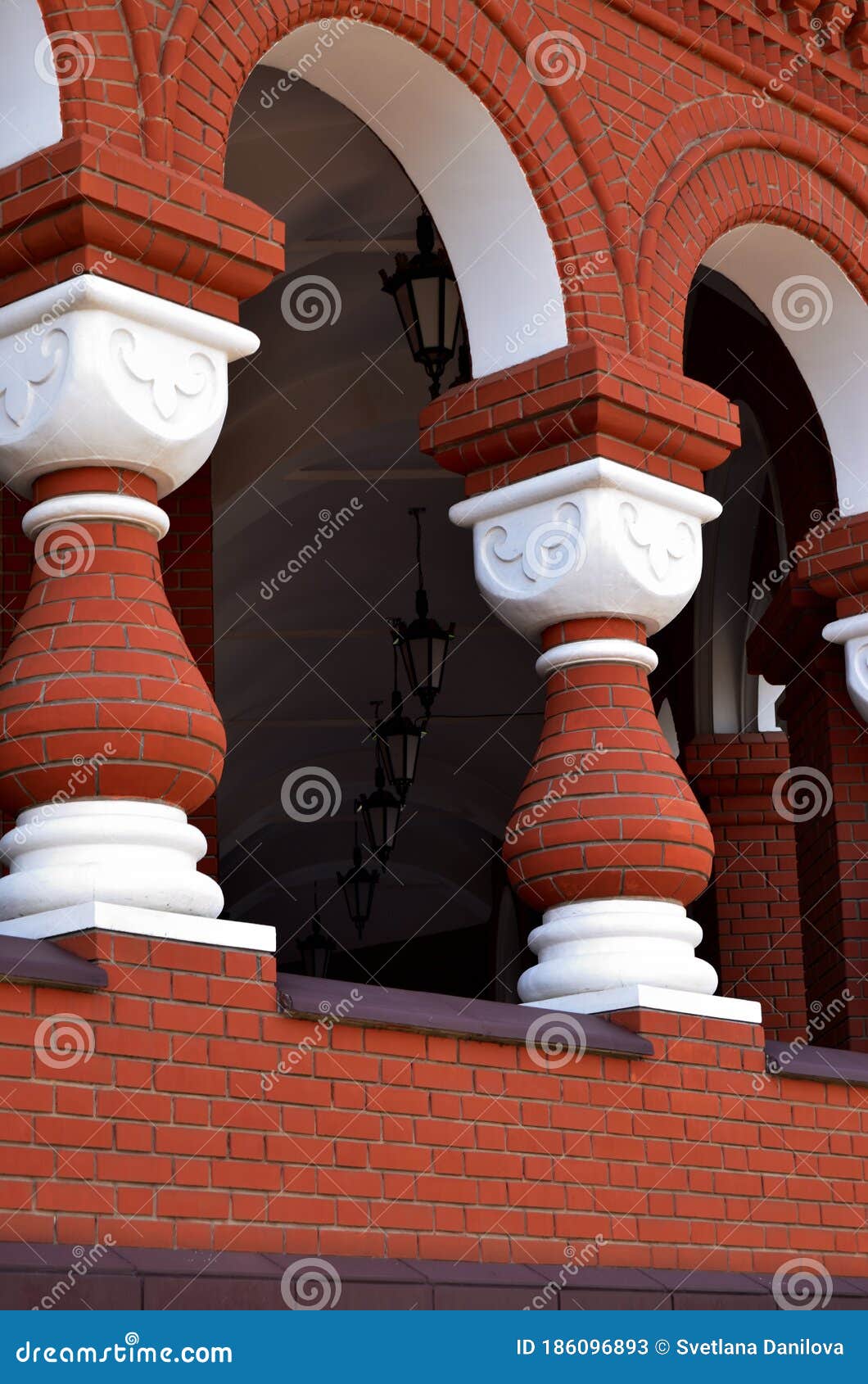 Columns with Red Brick Arches and Lanterns Under the Ceiling in the ...