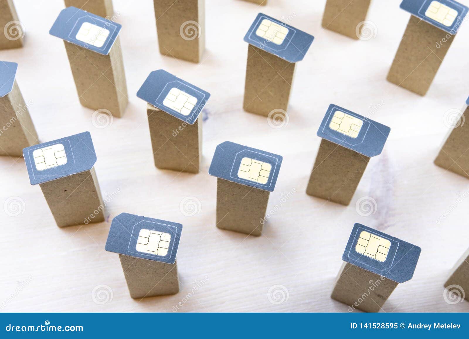 Columns with SIM Cards at the Top are Placed on a White Surface Stock ...