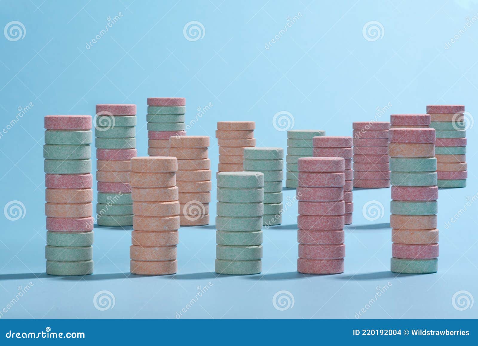 Columns of Tablets on a Light Blue Background Stock Photo - Image of ...
