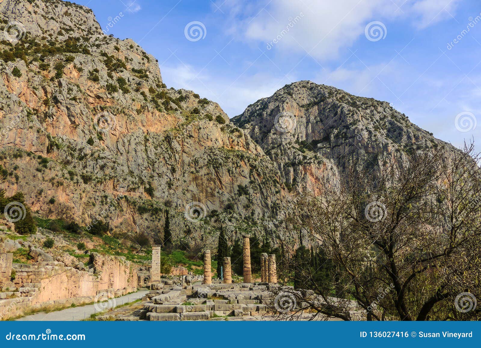 Columns of Temple of Apollo Dwarfed by Mountain at Mountainside ...