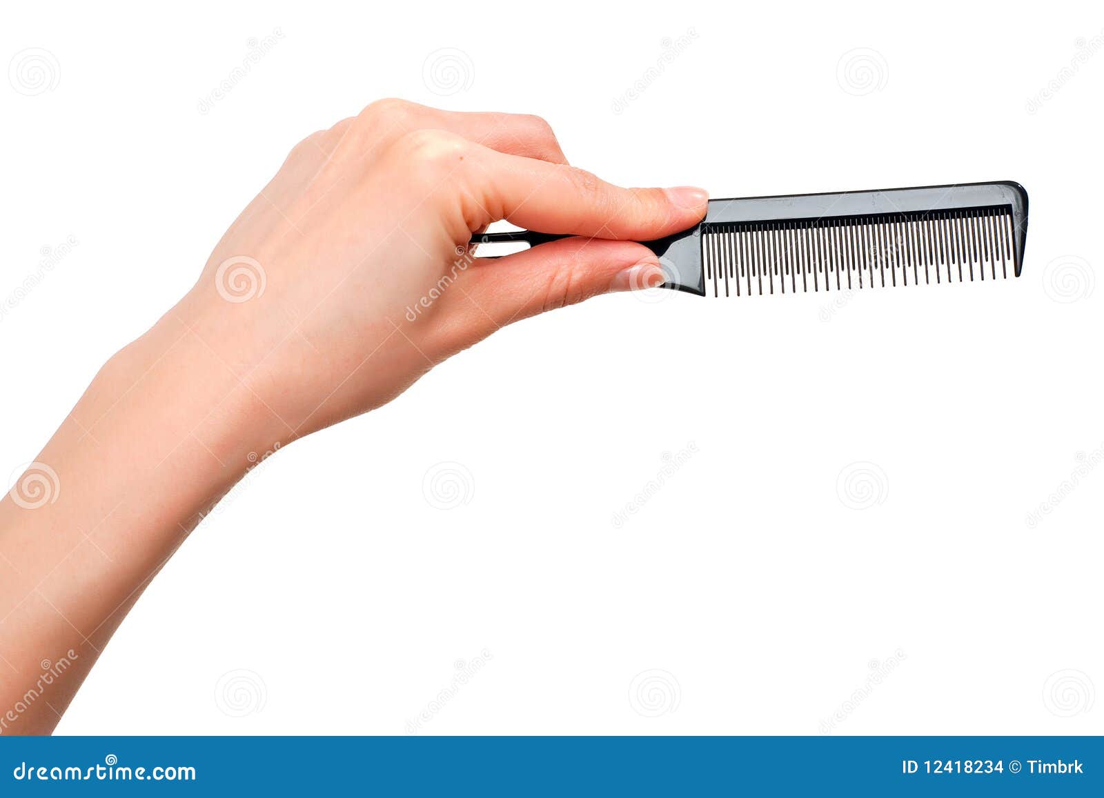Comb in the hand stock photo. Image of handle, equipment - 12418234