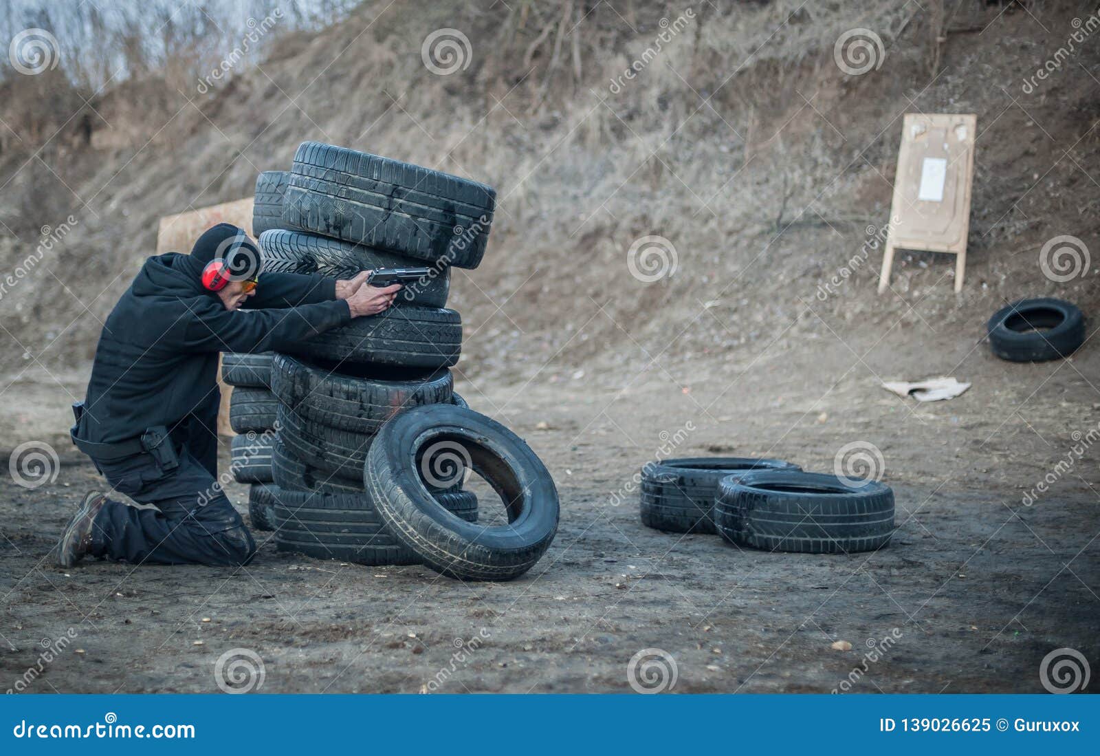 Combat Gun Tactical Shooting Behind and Around Cover or Barricade Stock ...