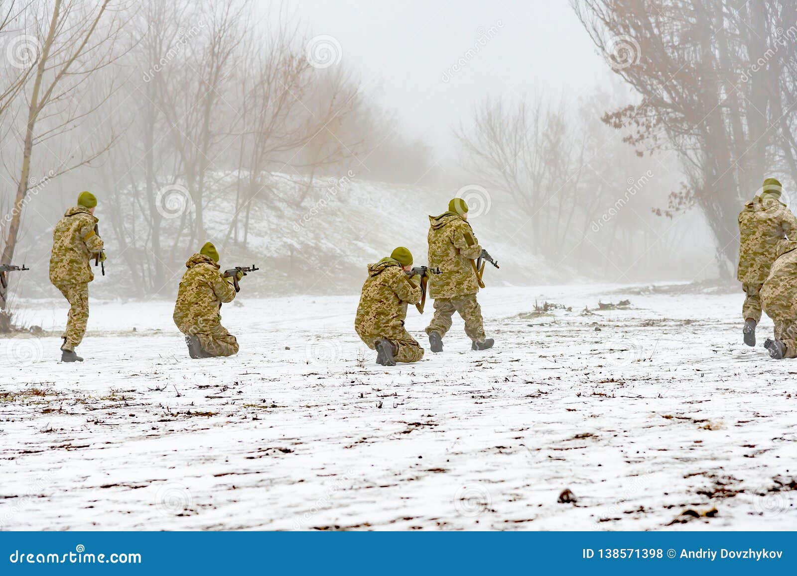 A Combat Squad in Camouflage with a Weapon Goes on the Offensive in ...