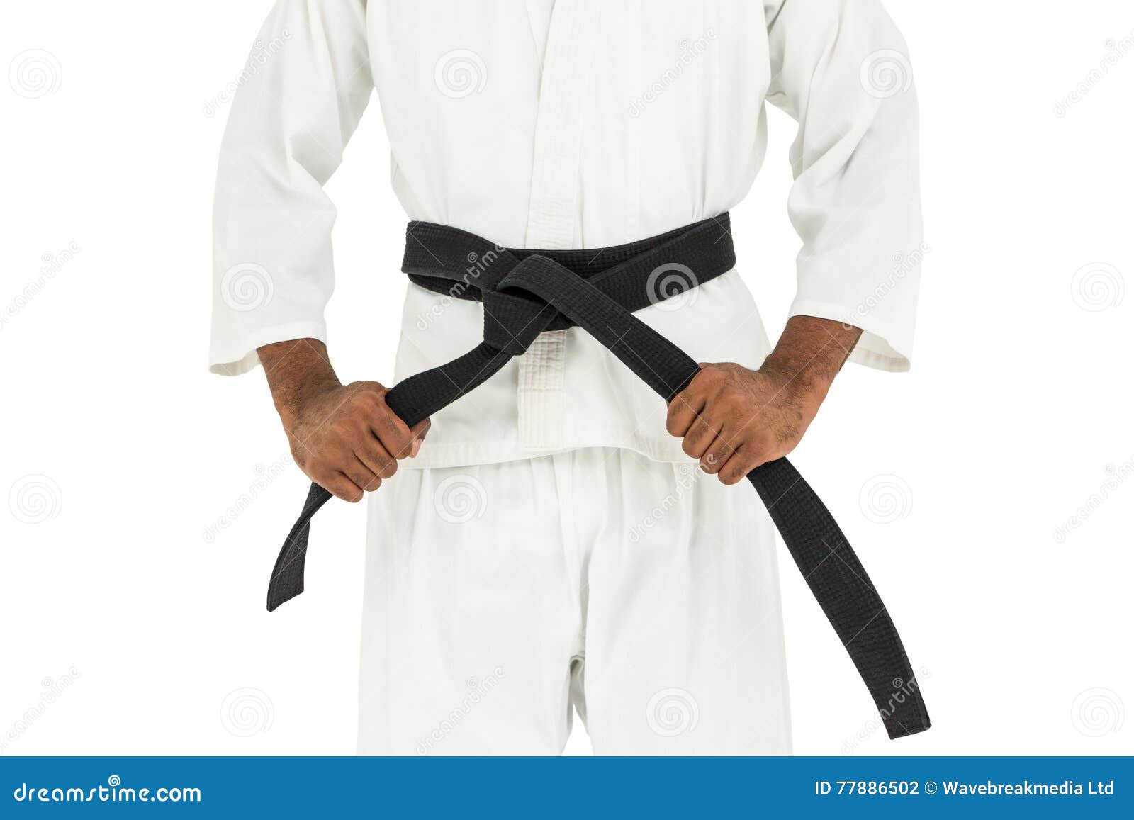Combattente Che Stringe La Cinghia Di Karatè Fotografia Stock ...