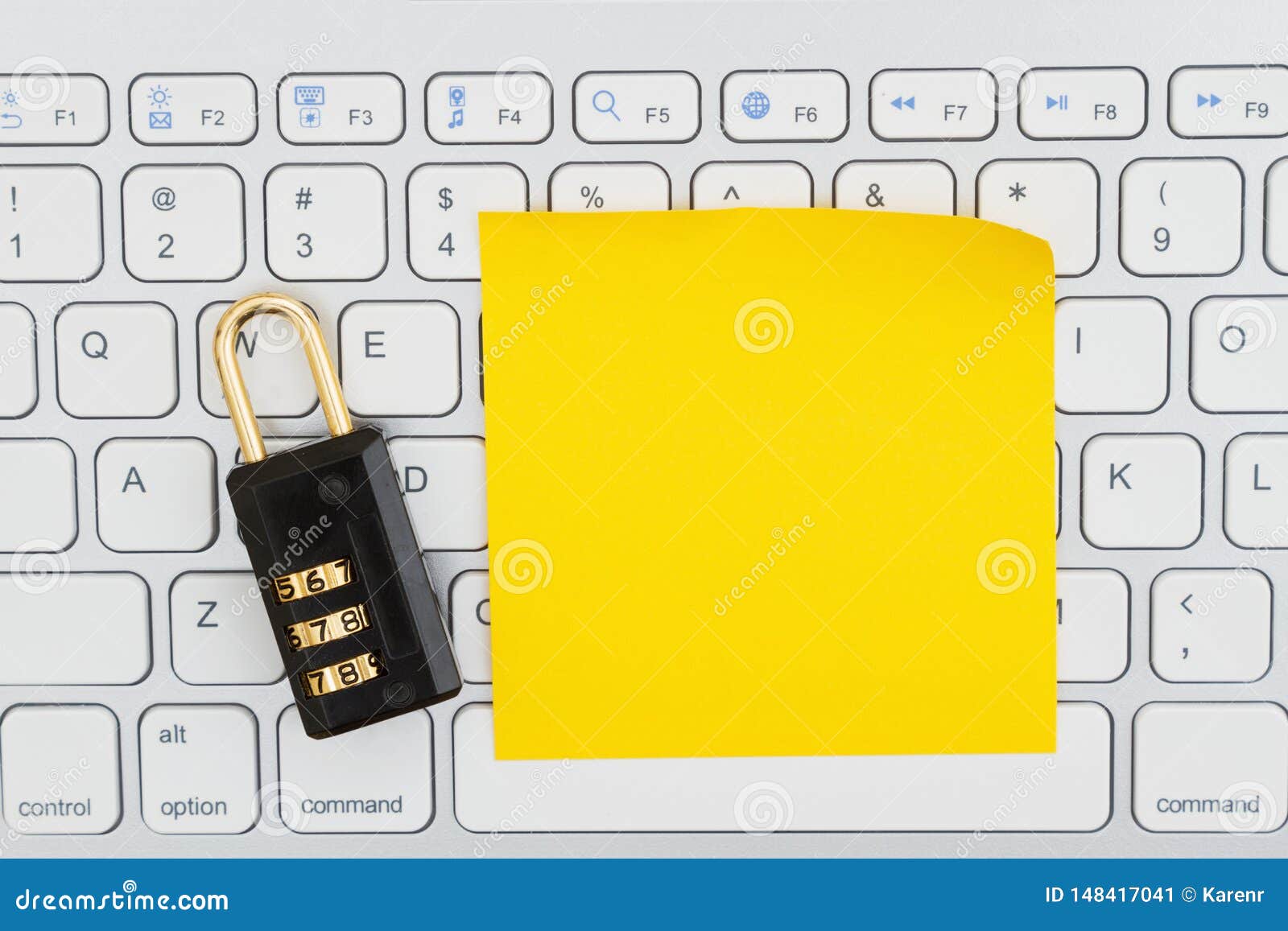 Combination Lock on a Keyboard with a Sticky Note Stock Image - Image ...
