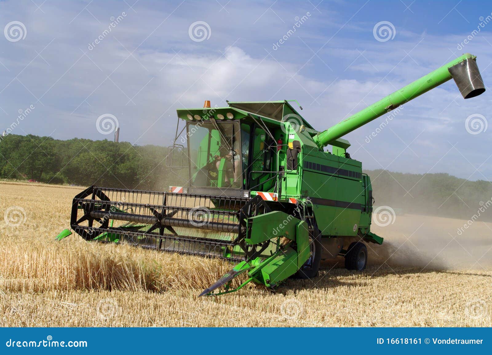 Combine on the field editorial photo. Image of field - 16618161