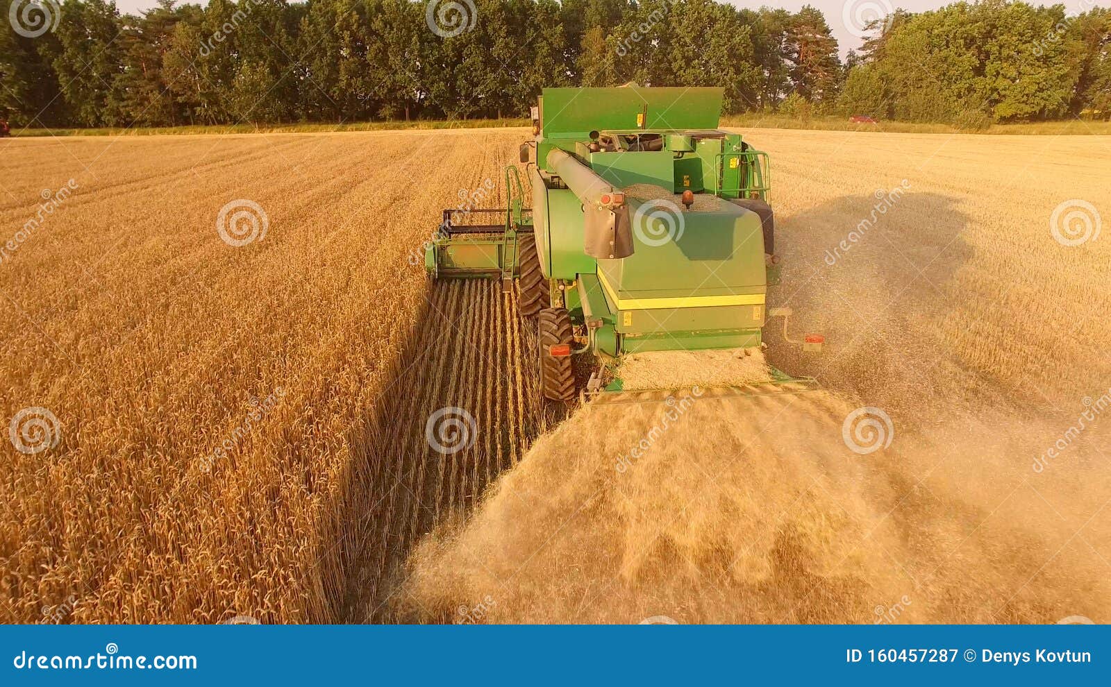 Combine, field and trees. editorial photography. Image of agricultural ...