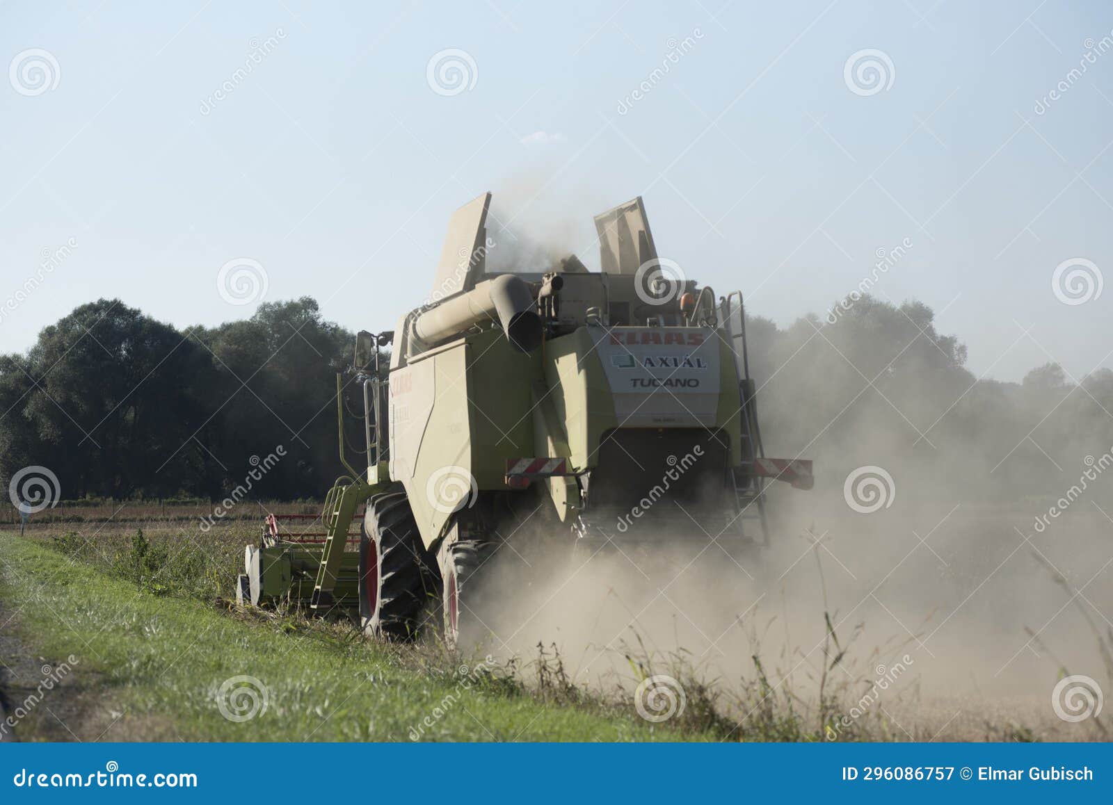 A Combine Harvester in the Corn Harvest Editorial Photography - Image ... A Combine Harvester in the Corn Harvest Editorial Photography - Image ...