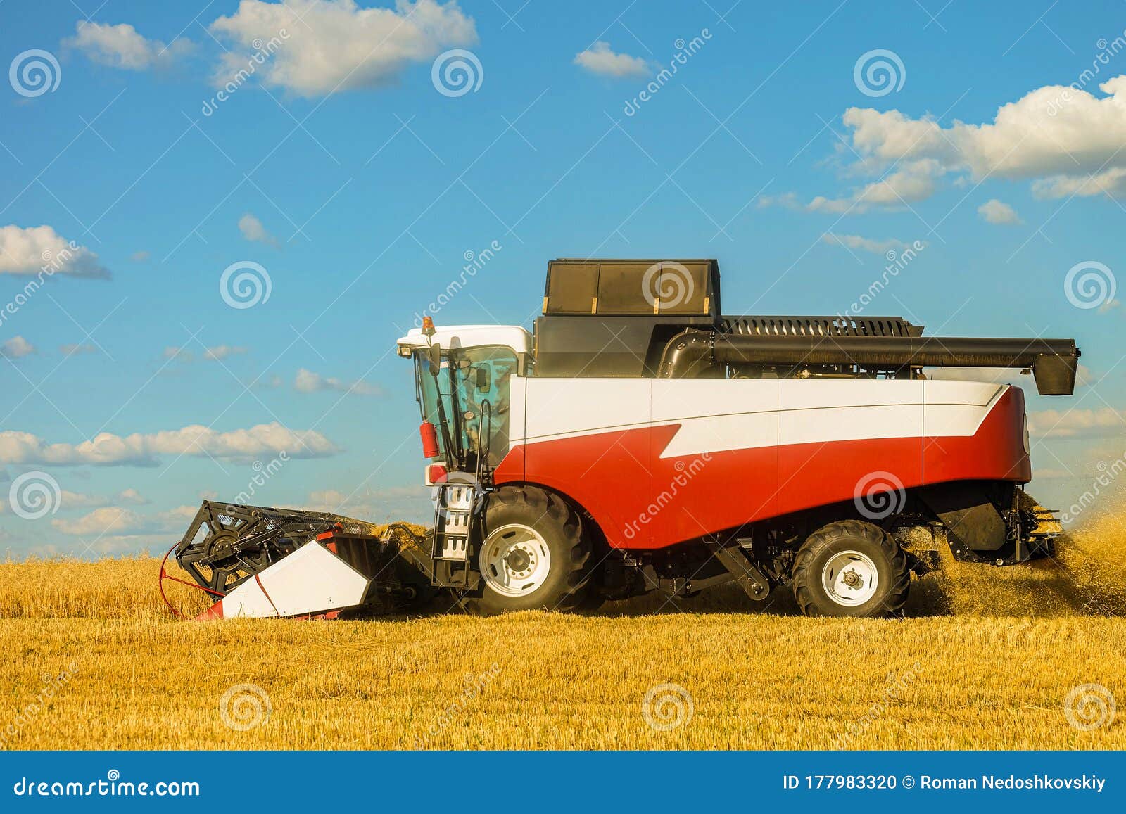 Combine Harvester in the Field during the Harvest Stock Photo - Image ...