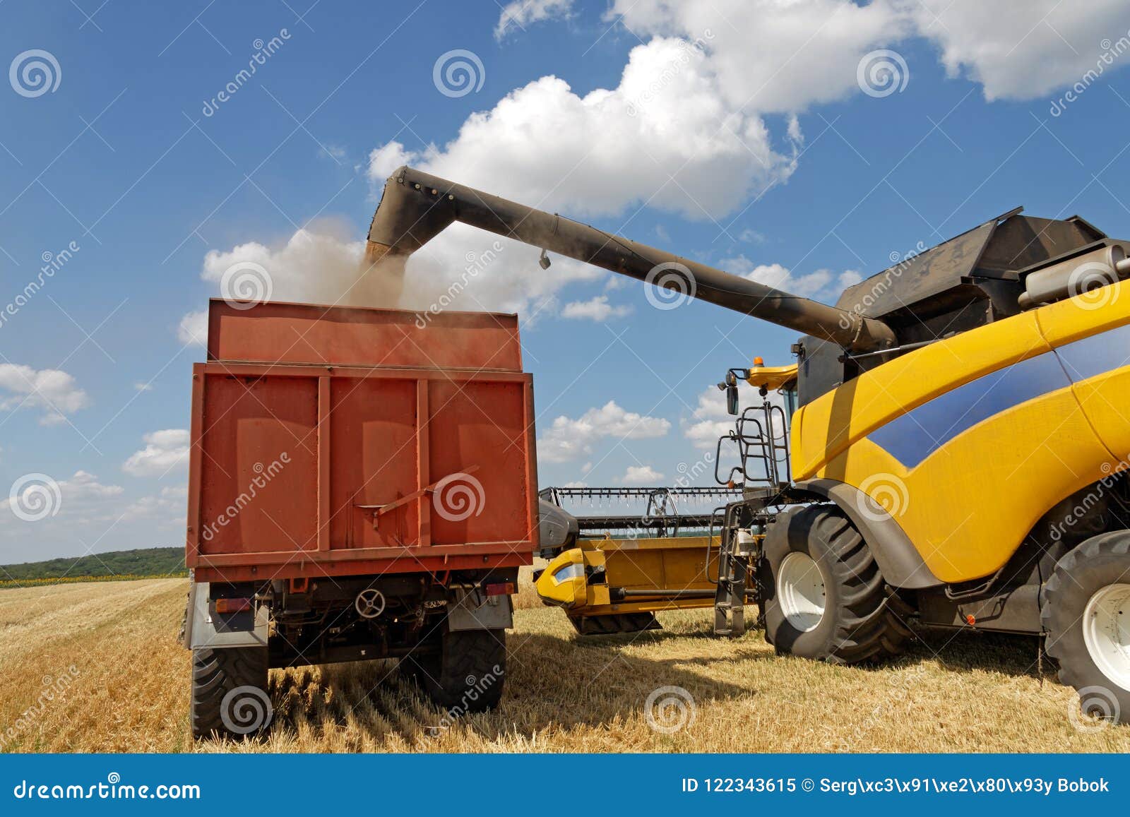 Combine Harvester Load Wheat in the Truck Stock Image - Image of farm ... Combine Harvester Load Wheat in the Truck Stock Image - Image of farm ...