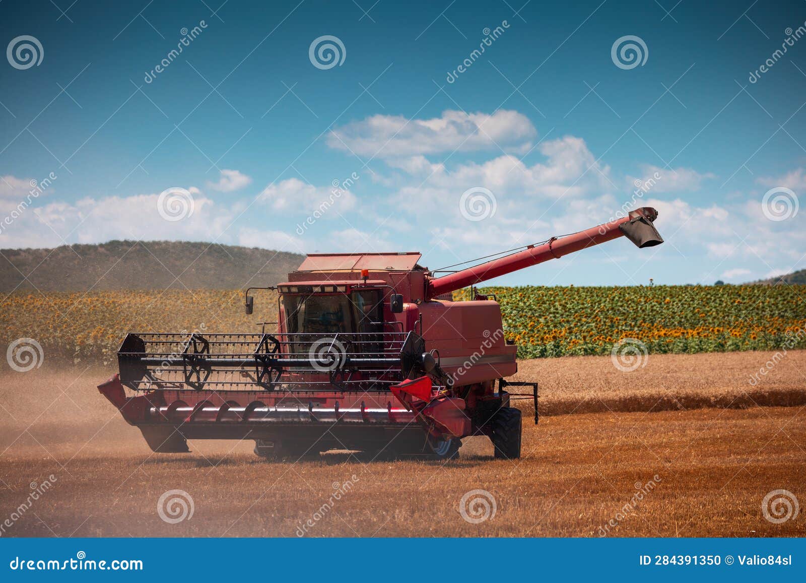 Combine Harvester Machine Working in a Wheat Field Stock Photo - Image ...