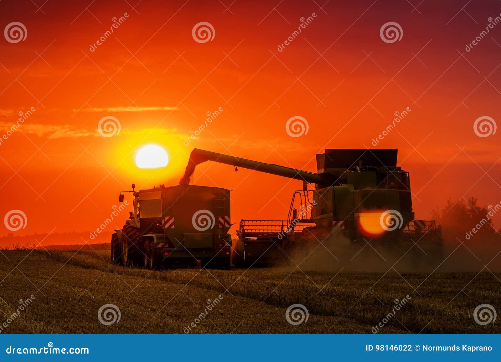 Combine Harvester at Sunset Stock Photo - Image of rural, farm: 98146022