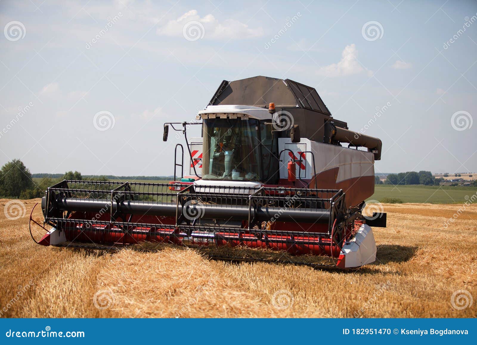 Combine Harvester on a Wheat Field Stock Photo - Image of harvesting ...