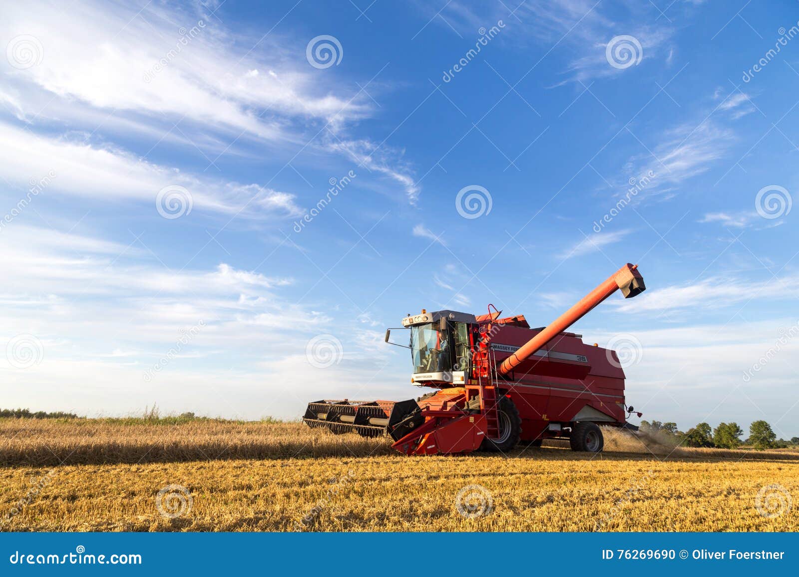 Combine harvester at work editorial image. Image of crop - 76269690