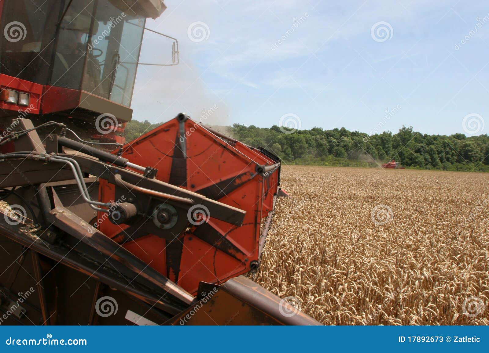 Combine harvesting wheat stock image. Image of commodities - 17892673
