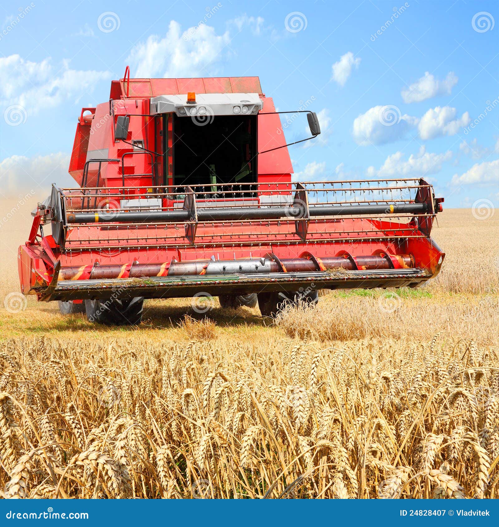Combine harvesting wheat. stock image. Image of moon - 24828407