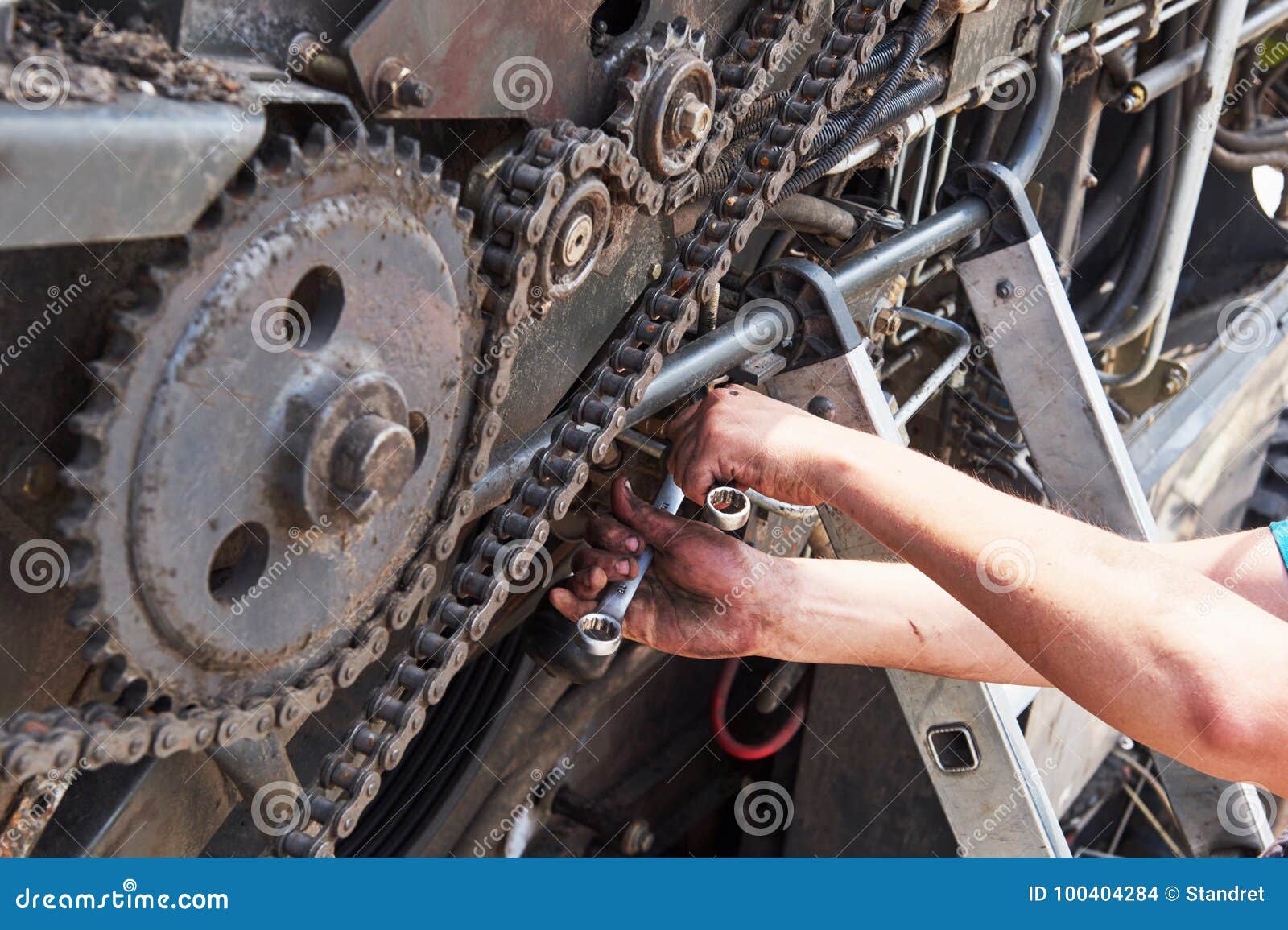 Combine Machine Service, Mechanic Repairing Motor Outdoors Stock Photo ...