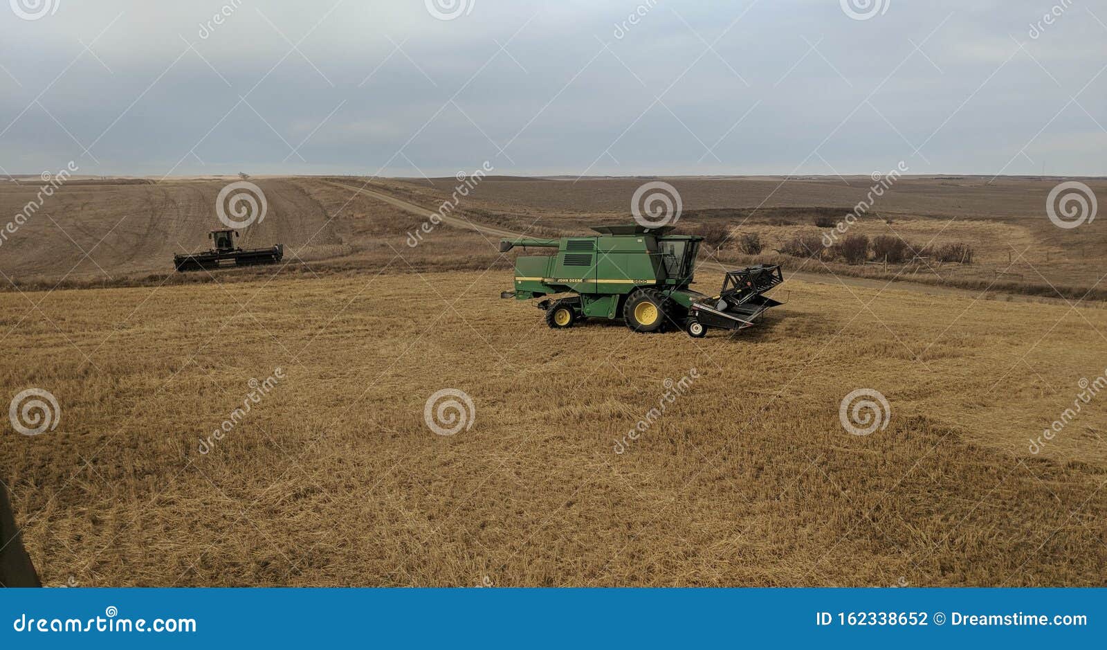 Combine and swather editorial photography. Image of swather - 162338652