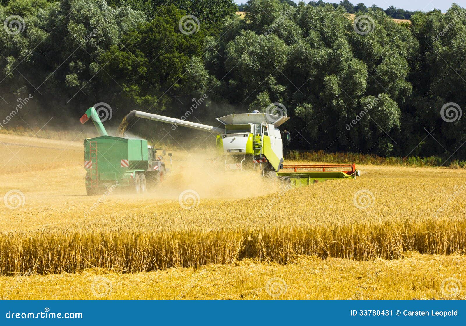 Combine Unloading To Trailer Stock Image - Image of food, barley: 33780431