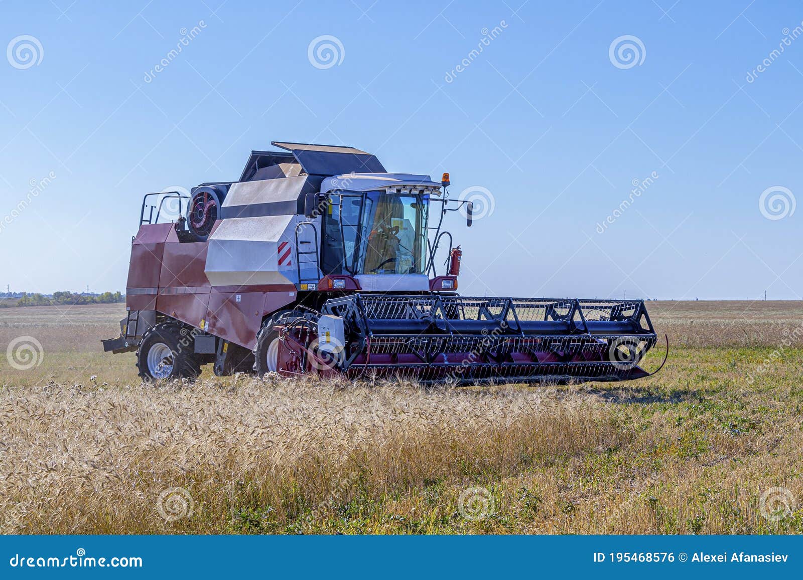 Combines and Other Equipment in the Fields during the Wheat Harvest ...