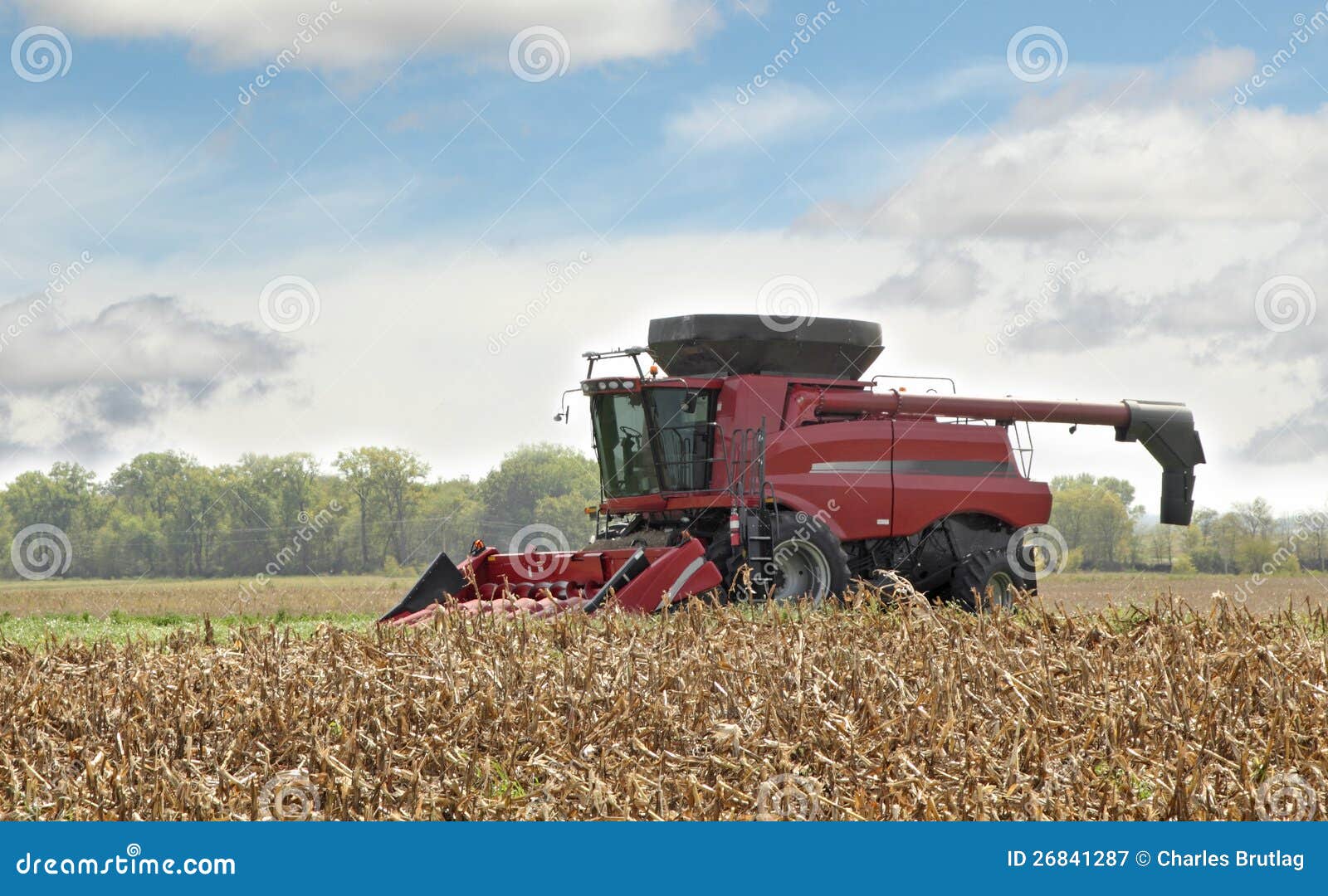 Combining a Corn Field stock image. Image of field, farm - 26841287