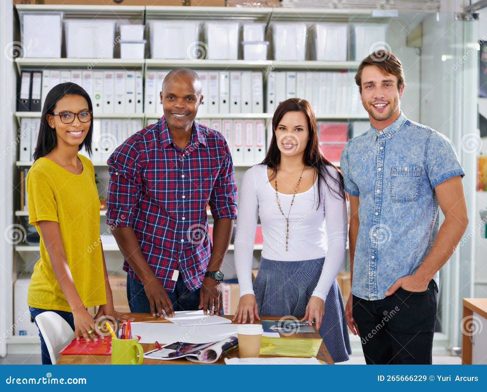 Combining Their Creative Juices. a Team of Design Professionals Working ...