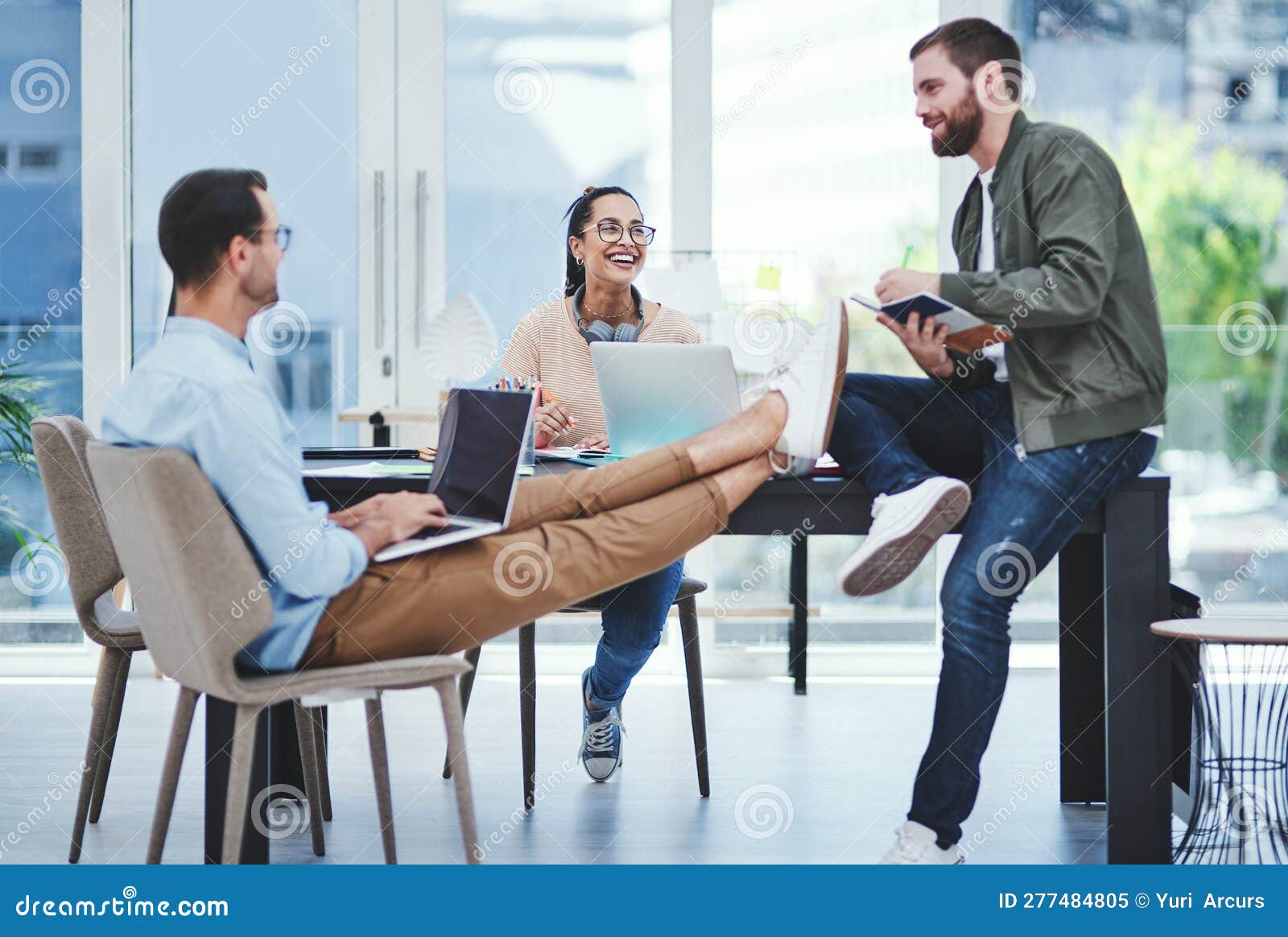 Combining Their Creative Juices. A Team Of Design Professionals Working ...