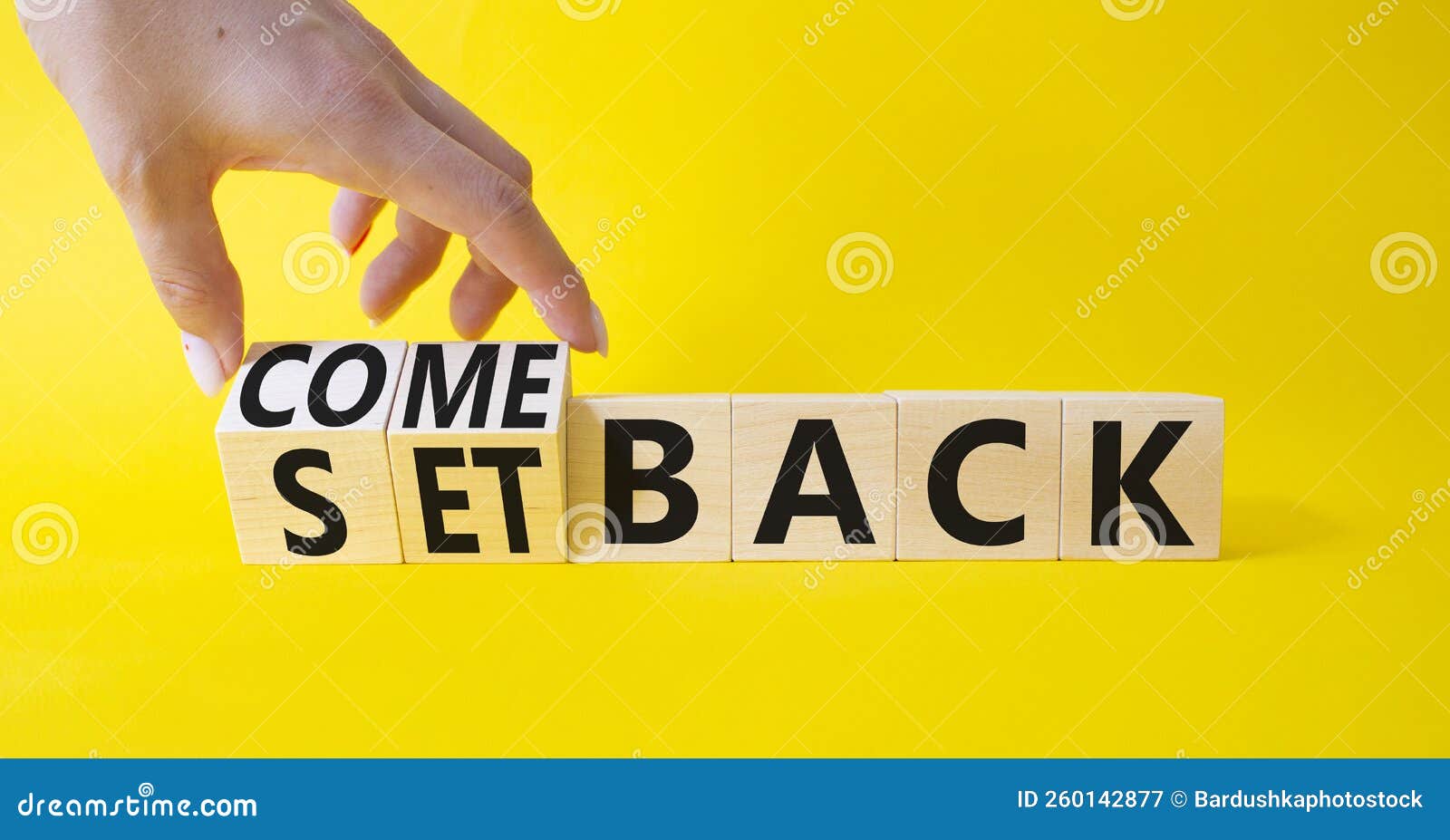 Comeback and Setback Symbol. Hand Turns a Cube and Changes the Word ...