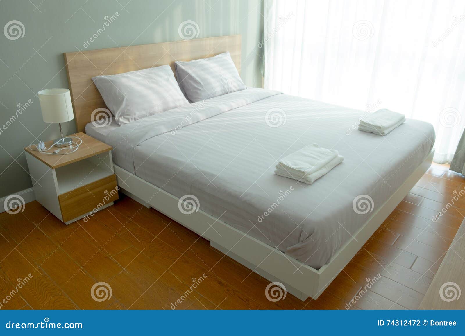 Comfortable Bed in Modern Bedroom Stock Photo - Image of floor ...
