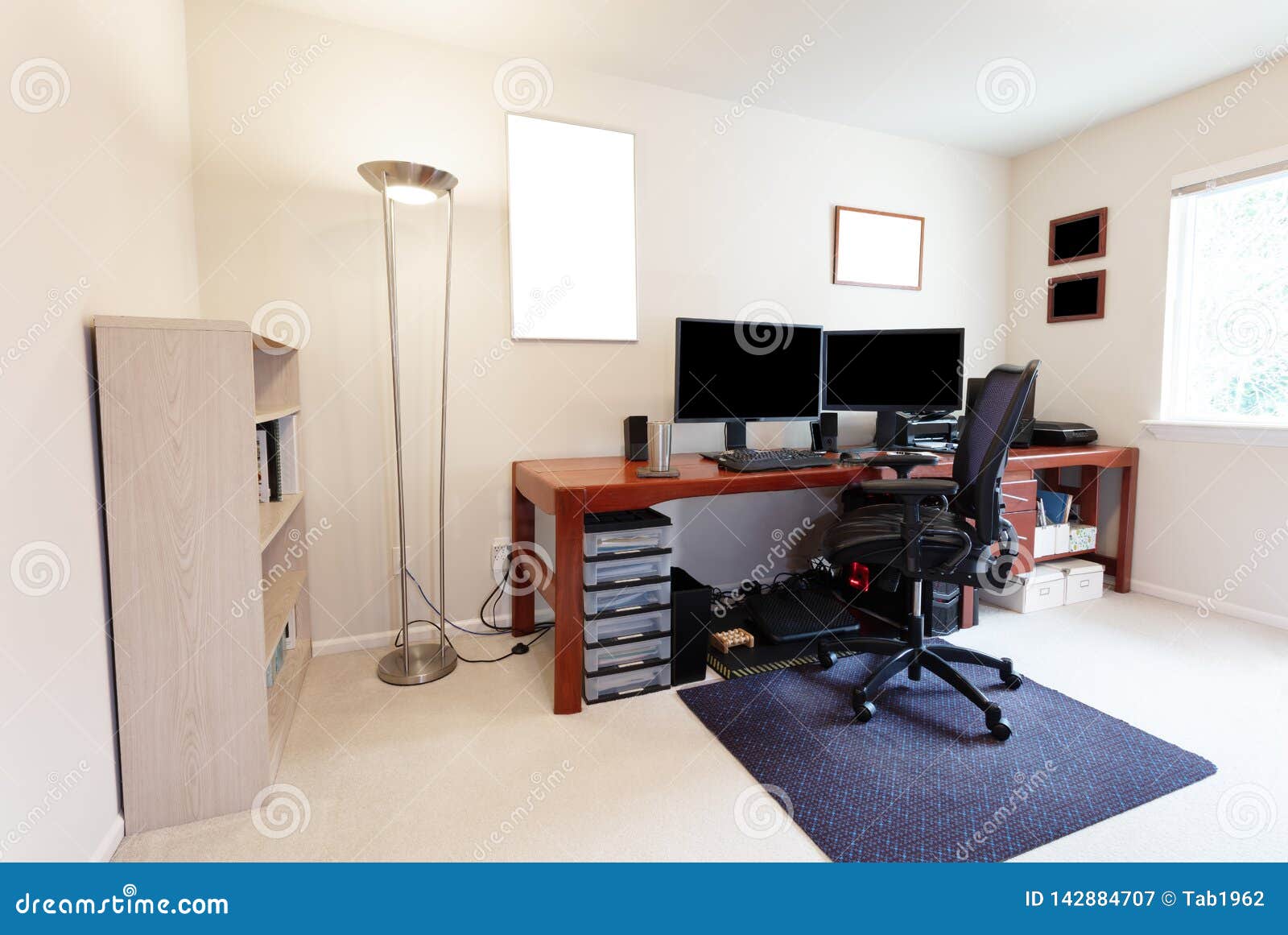 Computer Chair at Large Work Table with Computer Monitors and Other ...