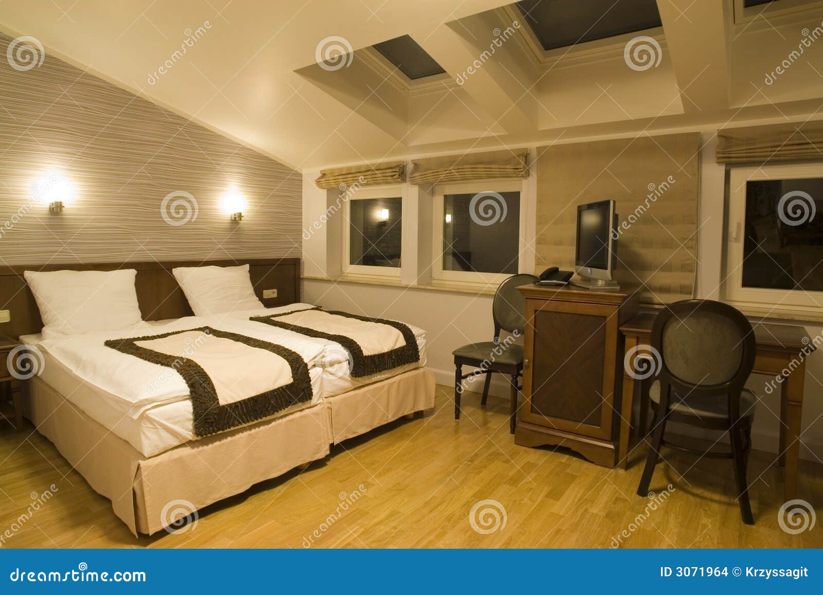 Comfortable hotel bedroom stock photo. Image of style - 3071964
